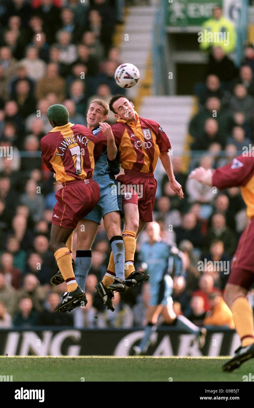 Bradford City's Jamie Lawrence (l) and Andy O'Brien (r) jump with ...