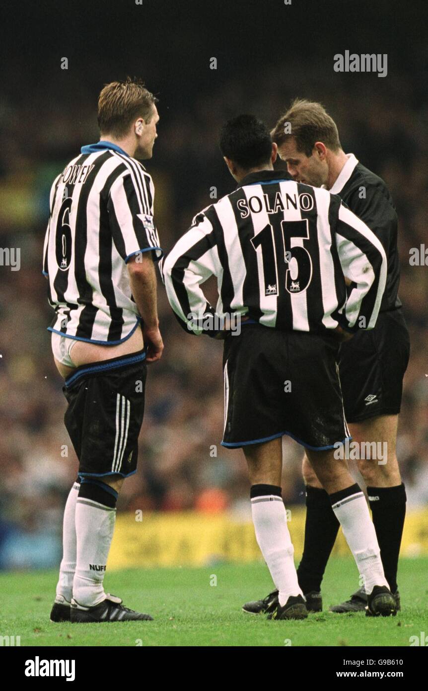 Newcastle United's Steve Howey (l) shows his opinion of being booked by ...