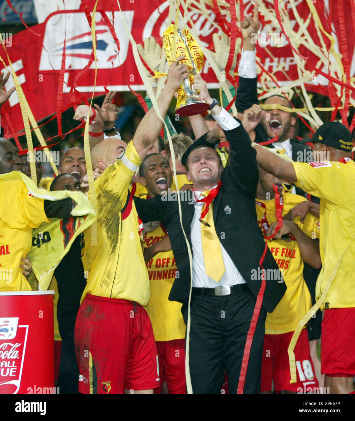 Watfords manager adrian boothroyd captain gavin mahon lift the trophy ...