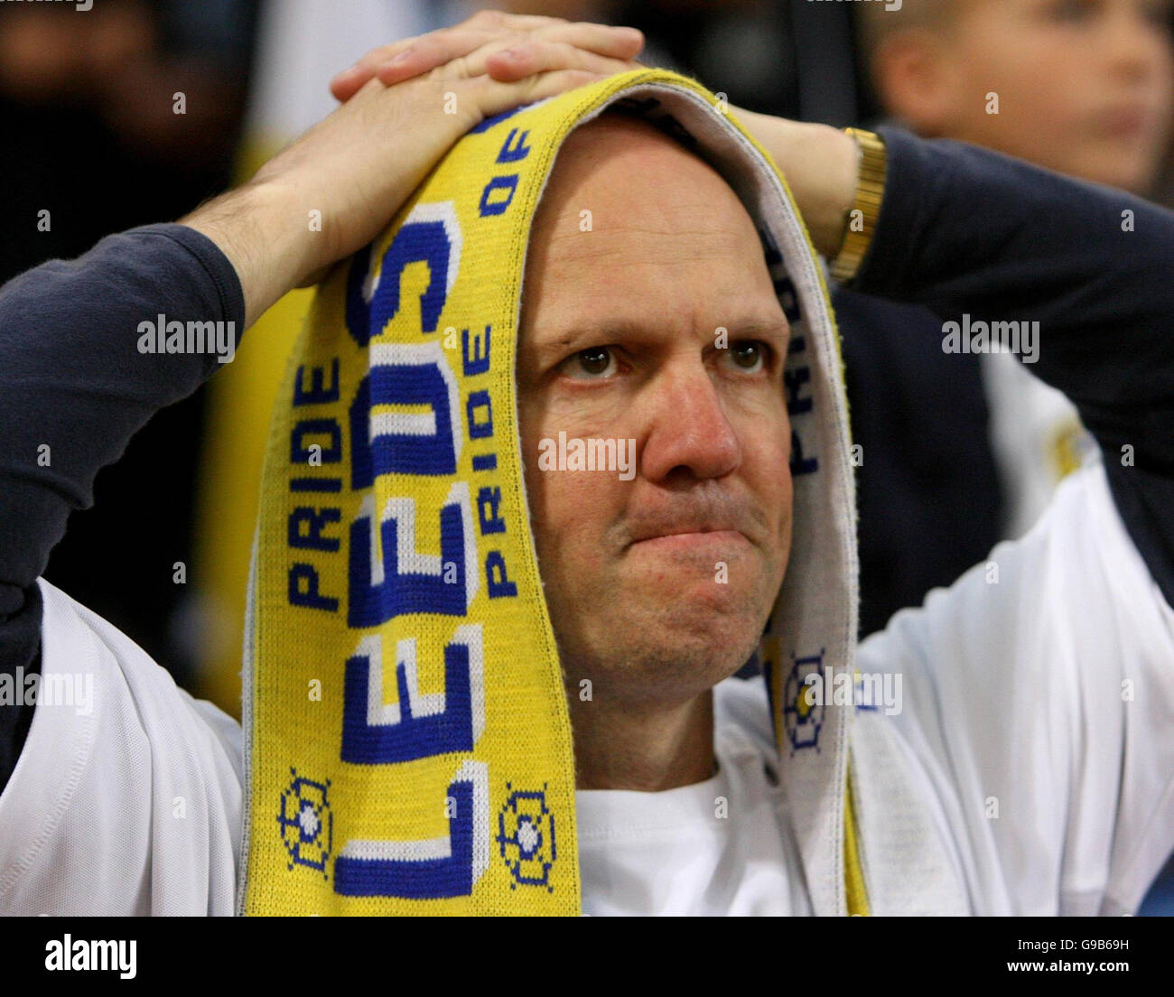Leeds United fan shows his dejection after defeat against Watford in ...