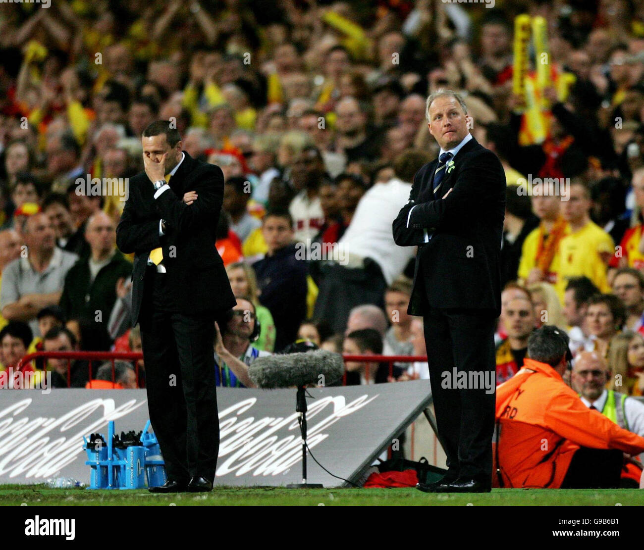 Watford's manager Adrian Boothroyd (L) shows the strain of victory just ...
