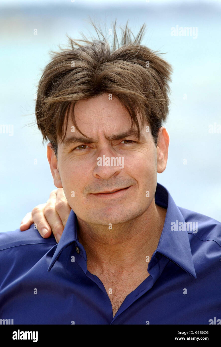 AP OUT. Charlie Sheen poses for photographers at the photocall for ...