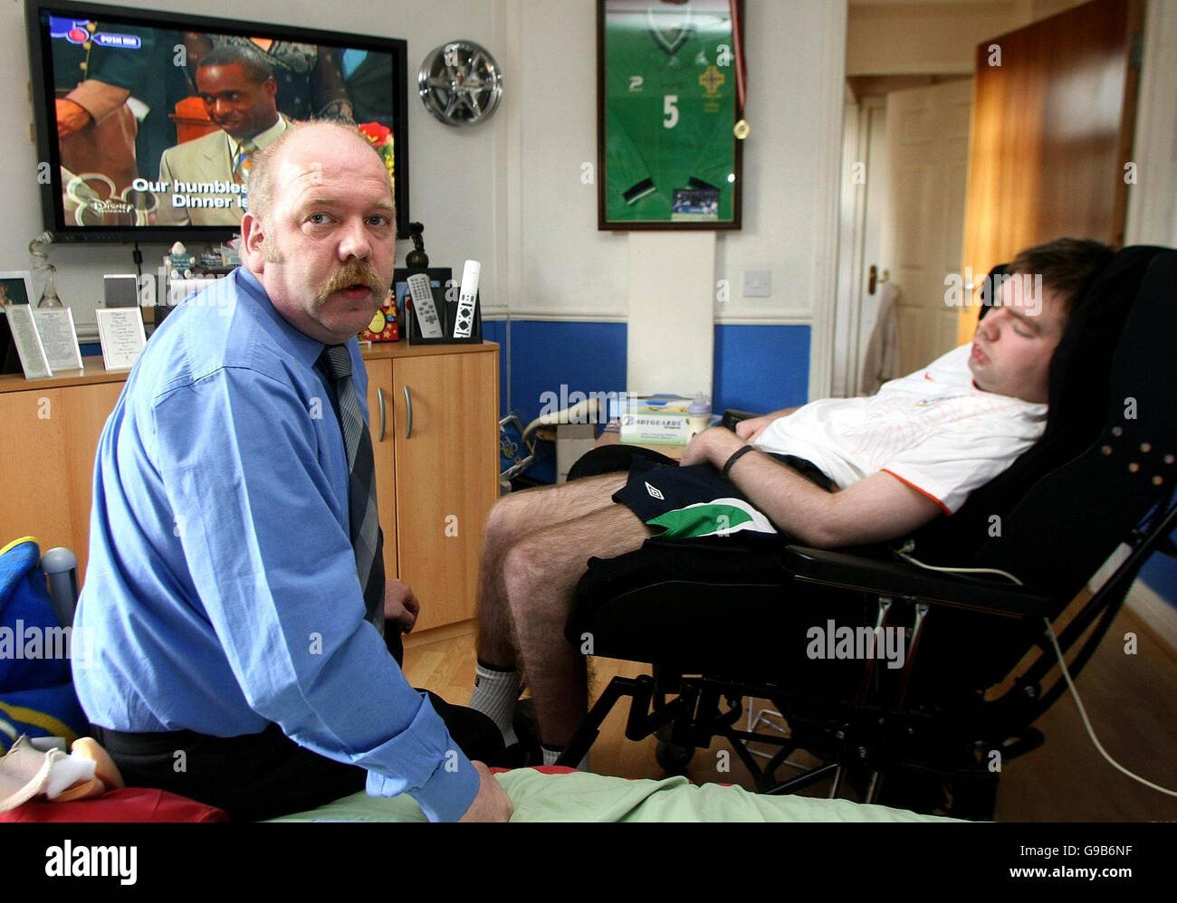 Don Simms (left) in his north Belfast home with 21-year-old son ...