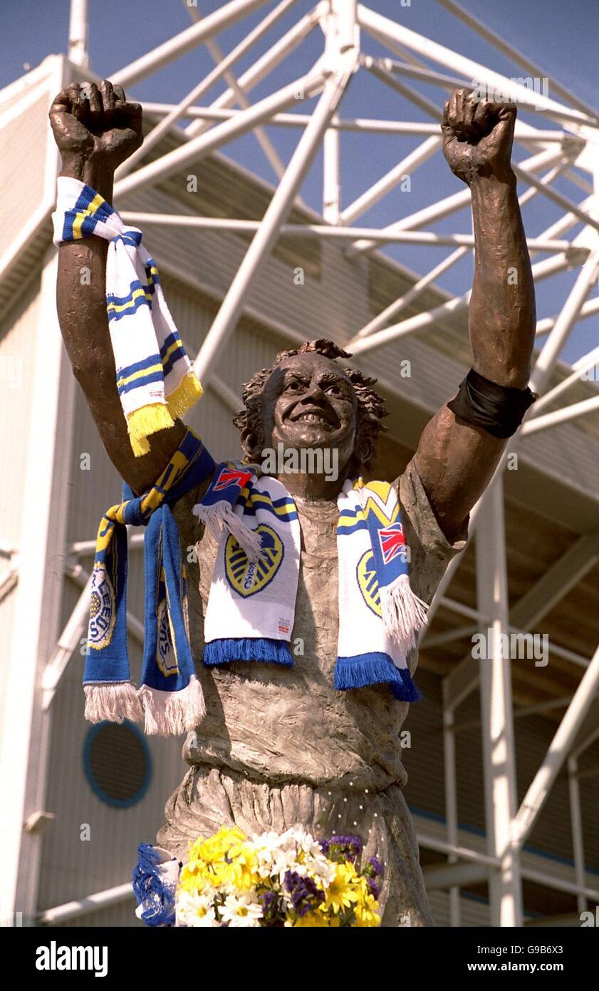 Flowers and scarves draped over the statue of Billy Bremner, in memory ...
