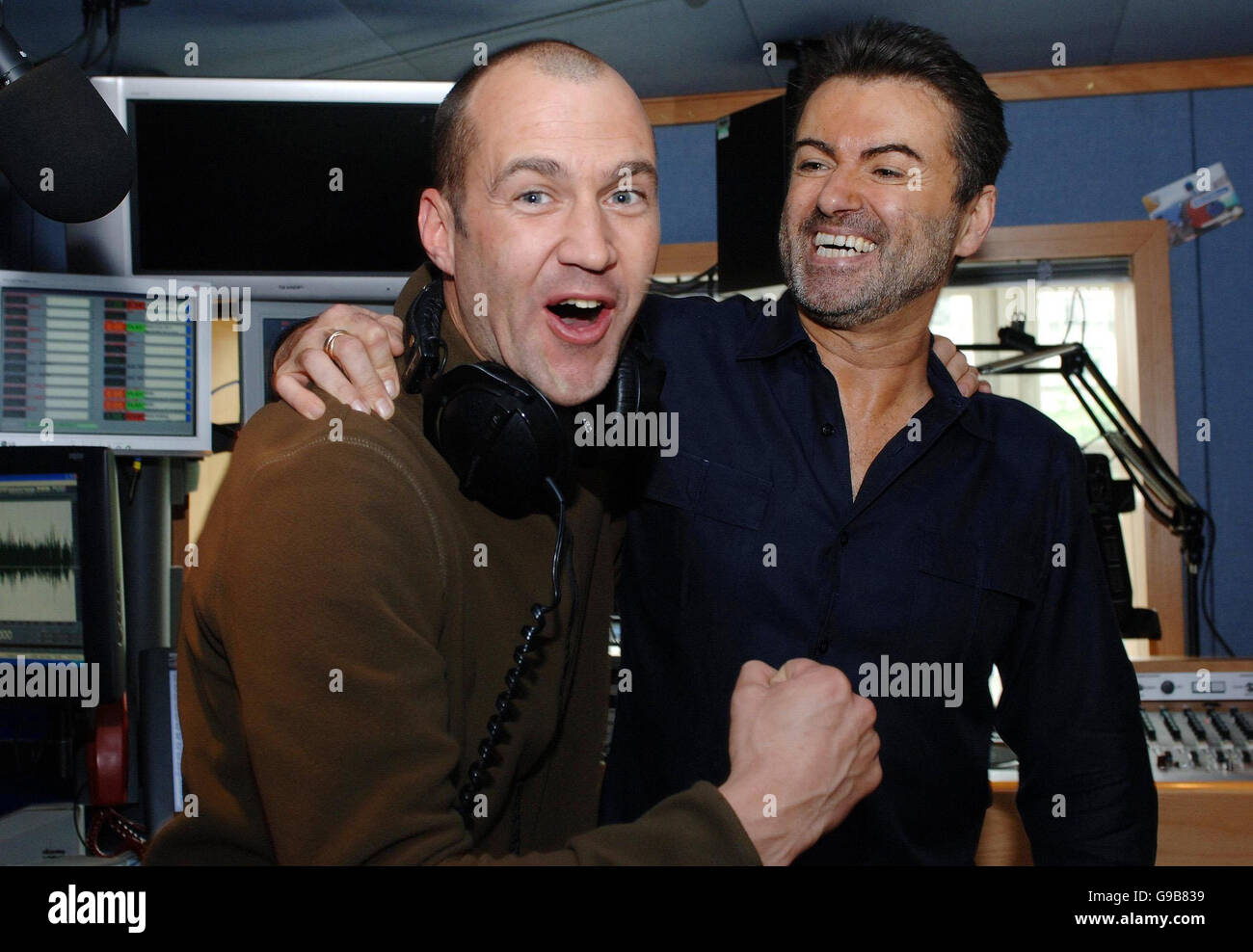 Capital Radio presenter Johnny Vaughan (left) with George Michael ...