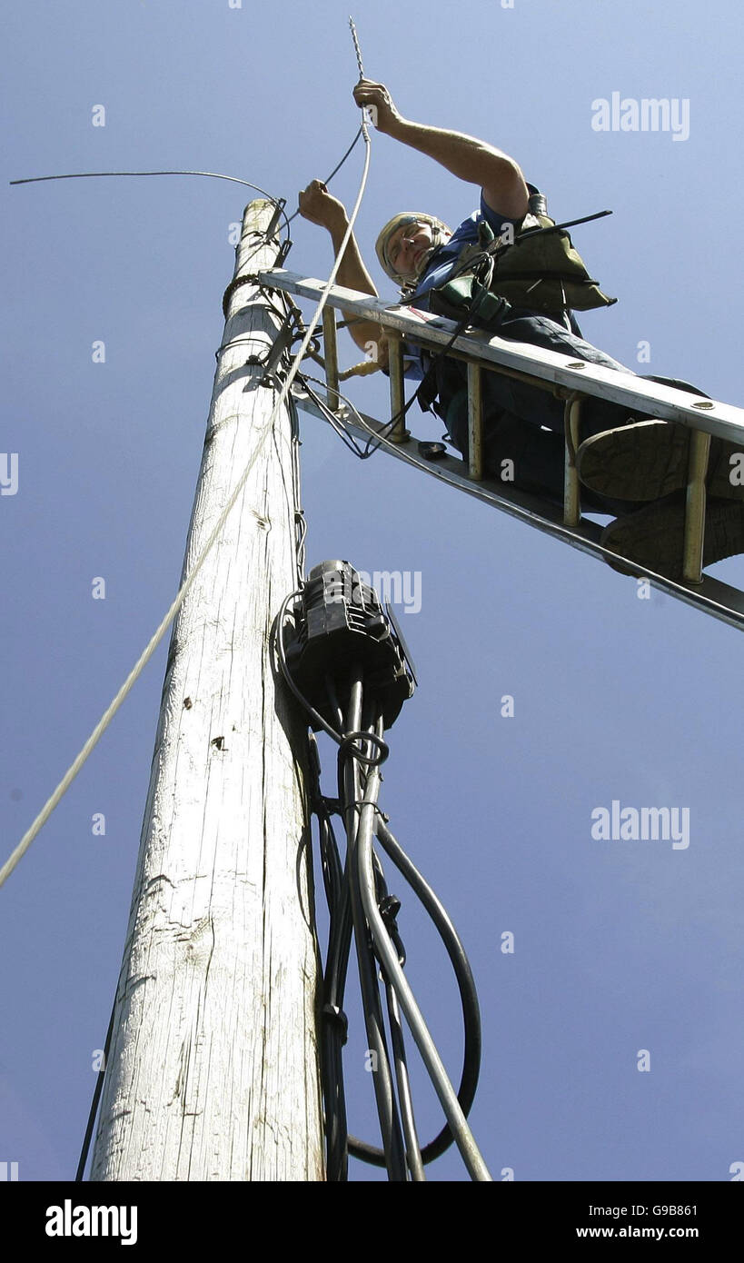 A generic picture of British Telecom engineers removing old telecom ...
