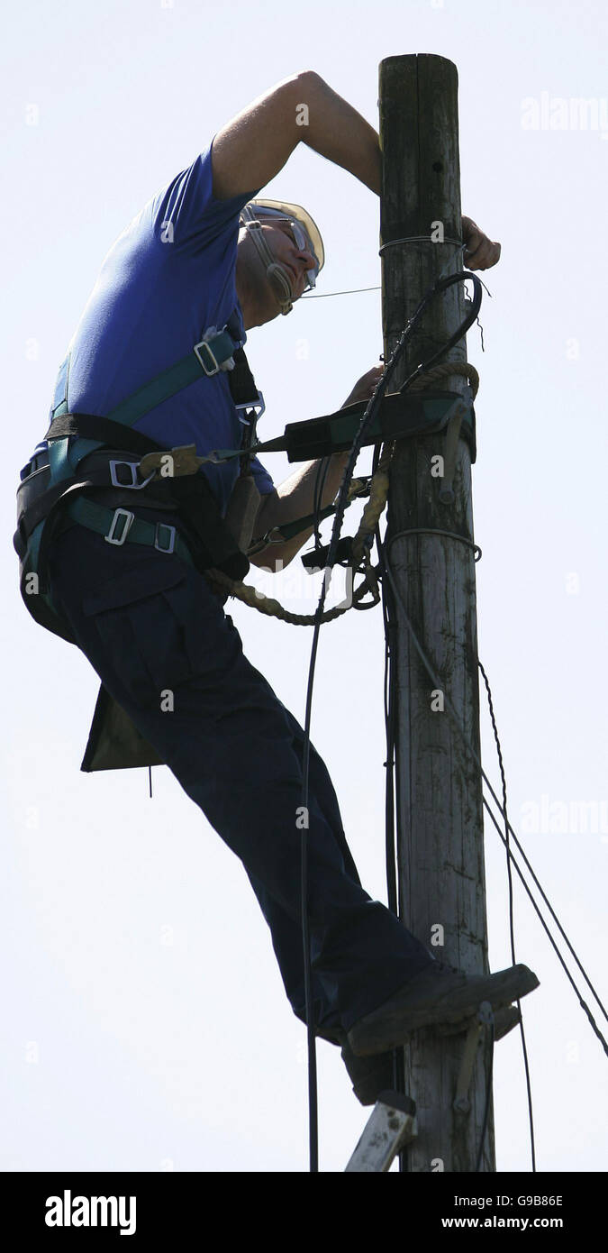 A generic picture of a British Telecom engineer removing old telecom ...