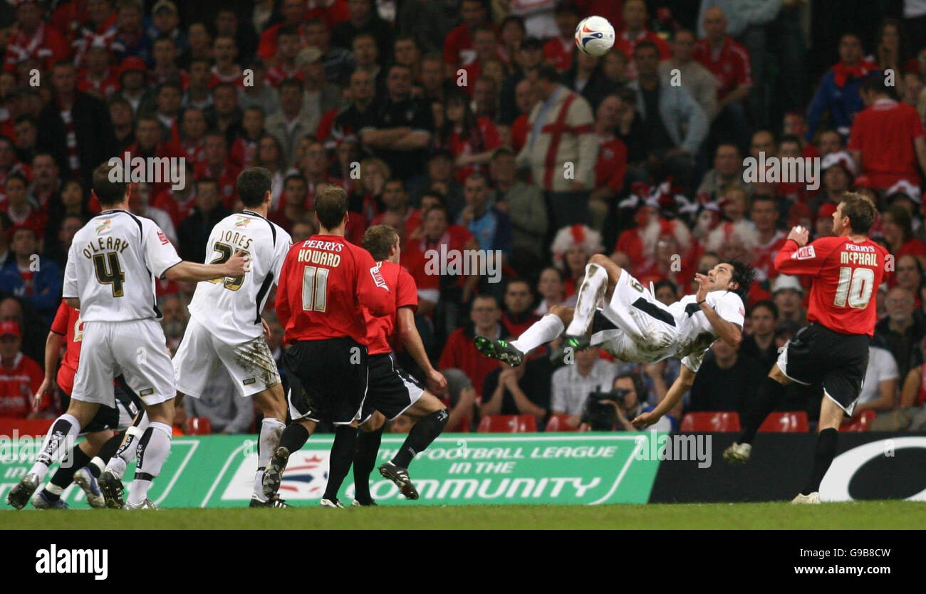 Swansea's Roy Fallon scores from an overhead kick during the Coca Cola ...
