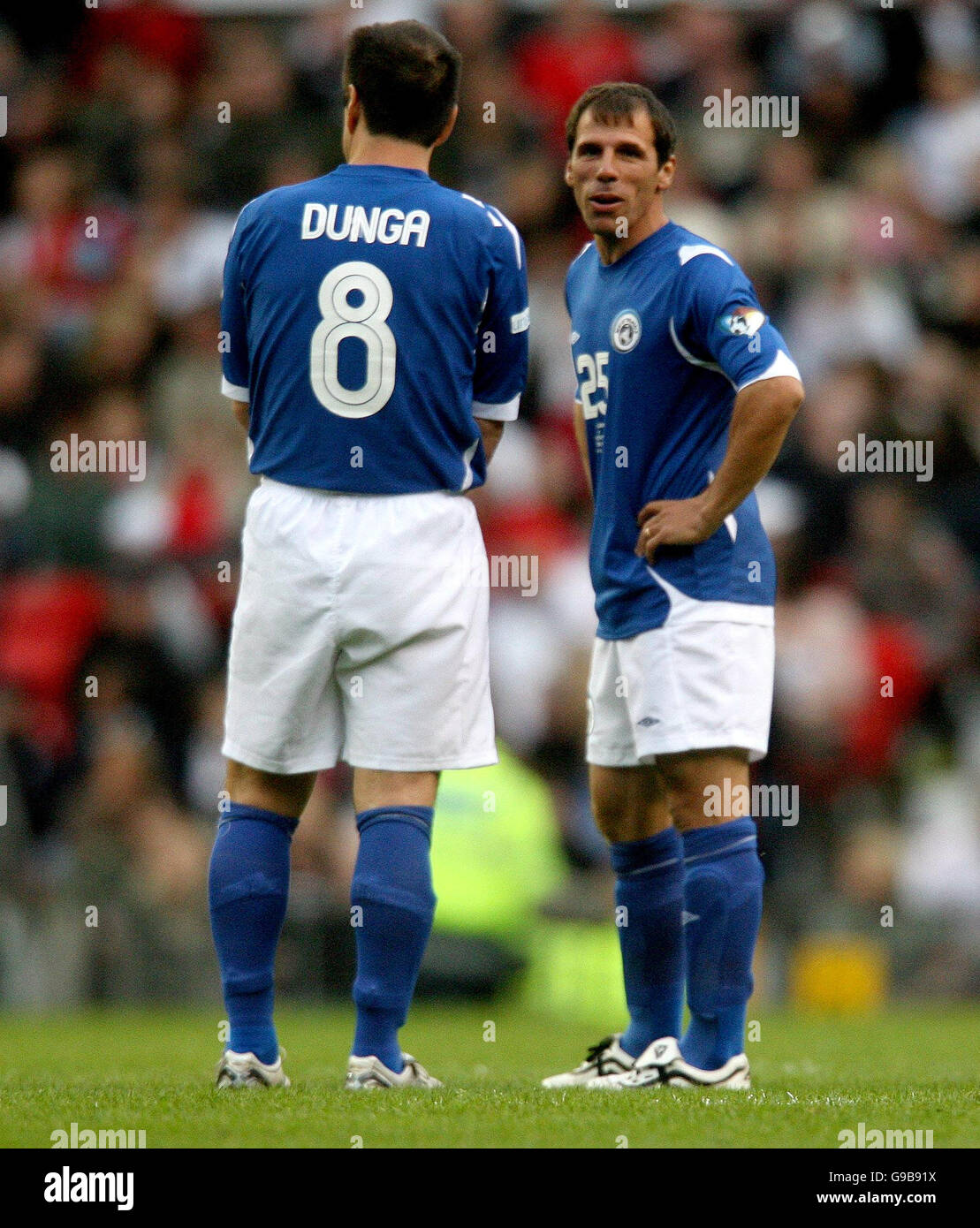 The Rest of the World's Gianfranco Zola and Dunga (left), during the ...