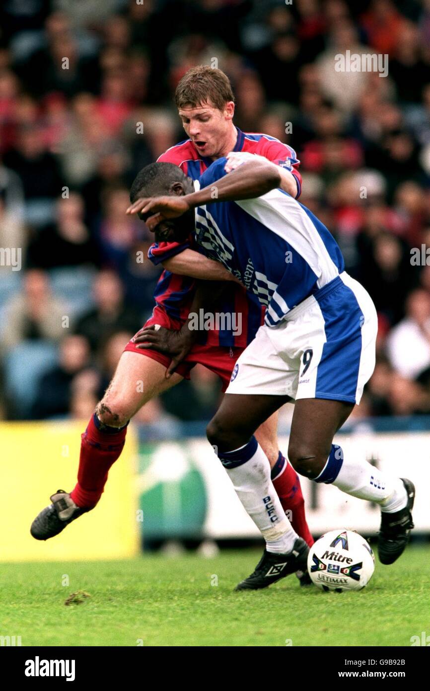 Birmingham's Paul Furlong is pushed off the ball by Crystal Palace's ...