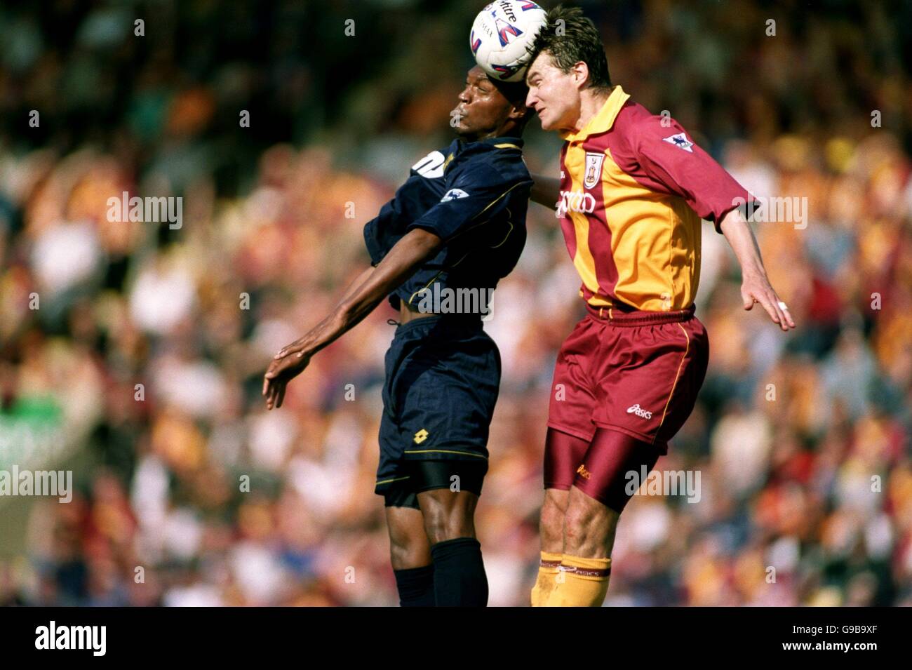 Wimbledon Carl Cort battles with Bradford's David Wetherall Stock Photo ...