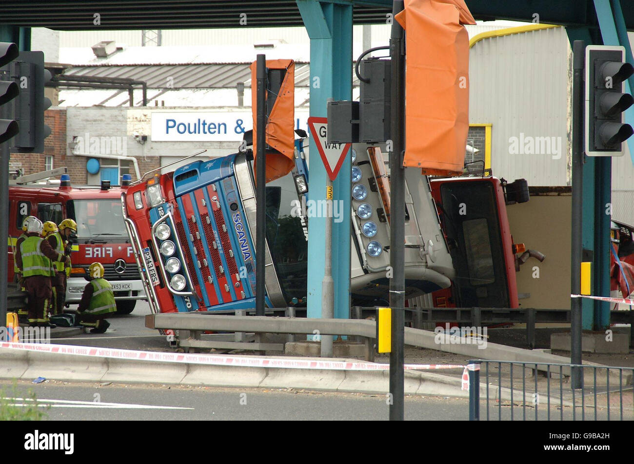 A lorry lies on its side after a road traffic accident at the Ripple ...