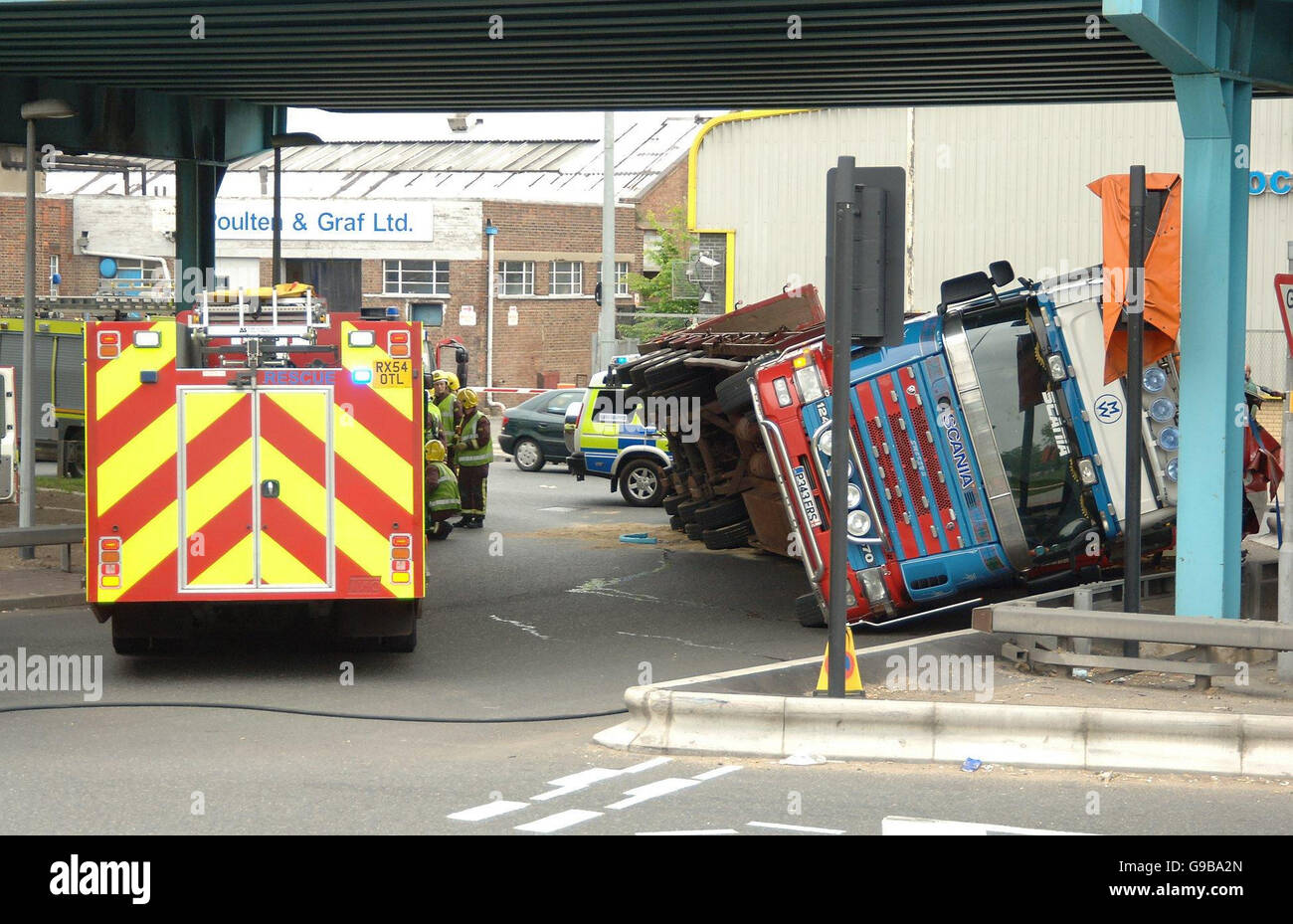 A lorry lies on its side after a road traffic accident at the Ripple ...