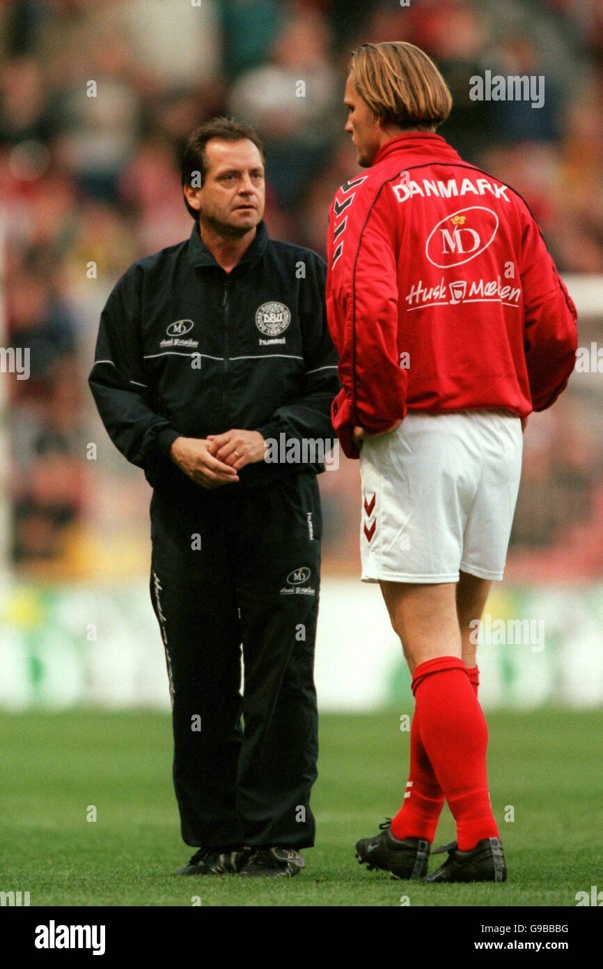 Denmark's Mikkel Beck (r) talks to a coach before the match Stock Photo ...