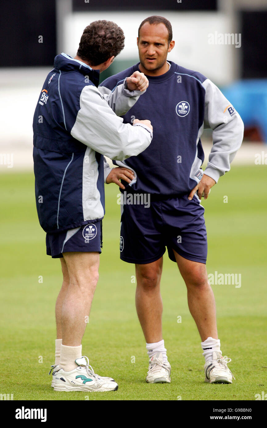 Surrey's Mark Butcher and Dave Naylor chat during nets Stock Photo - Alamy