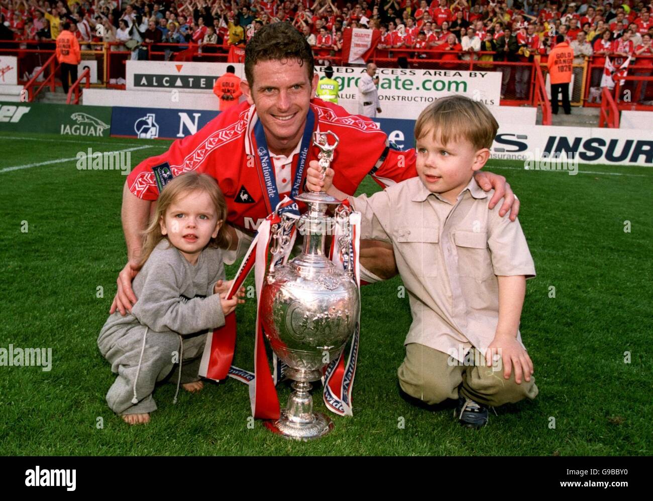 Charlton Athletic's Mark Kinsella, with his son and daughter celebrate ...