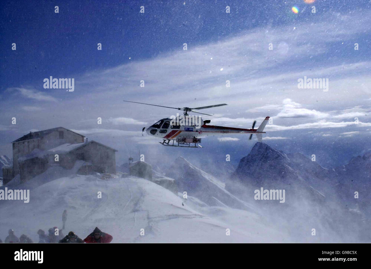 Skiers waiting to heli ski hi-res stock photography and images - Alamy