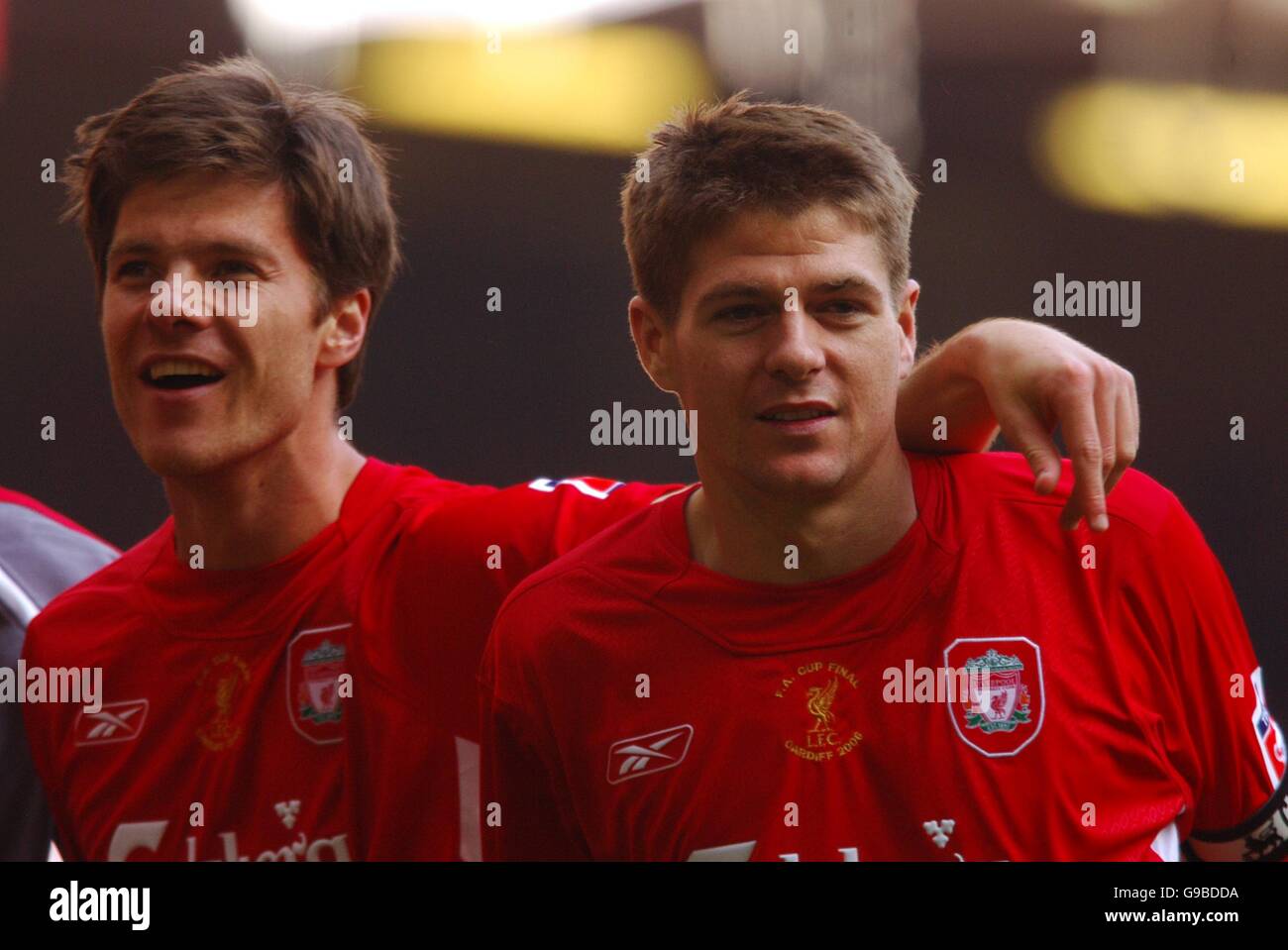 Liverpool's Xabi Alonso and Steven Gerrard celebrate winning the FA Cup ...