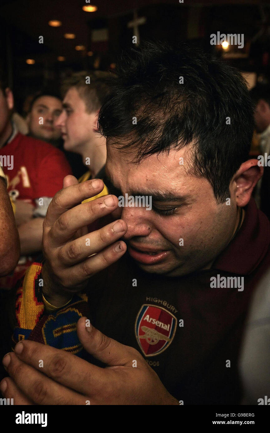 Arsenal fans watch their team lose the Champions League final to ...