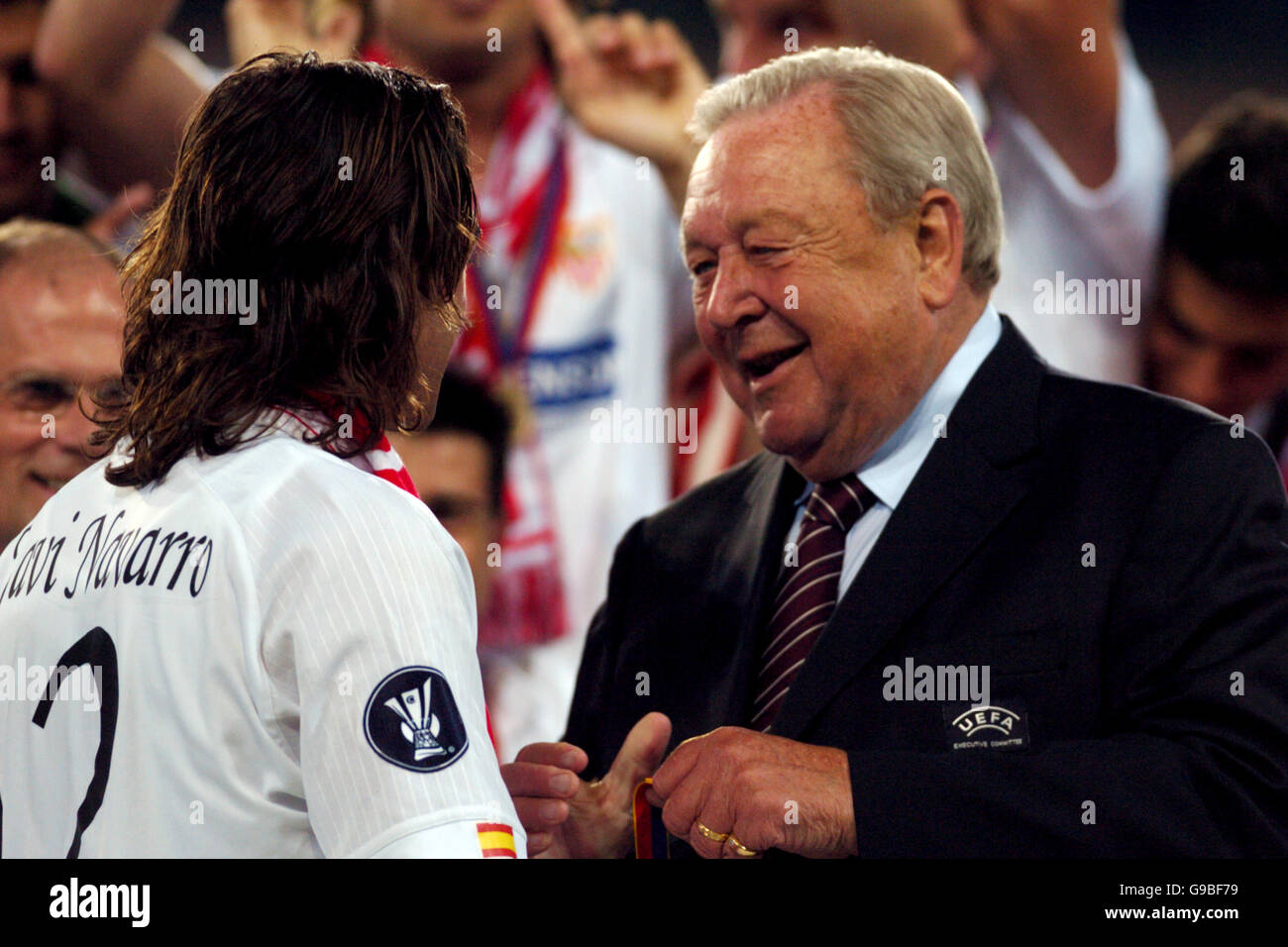 Sevilla's captain Javi Navarro recieves his winners medal from UEFA ...