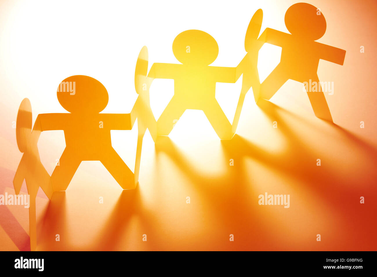 Team of paper doll people Stock Photo - Alamy