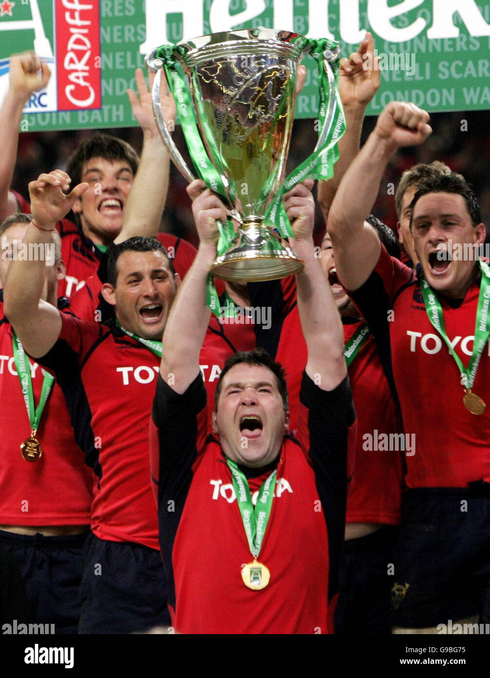 Munster captain Anthony Foley lifts the Heineken Cup following the ...