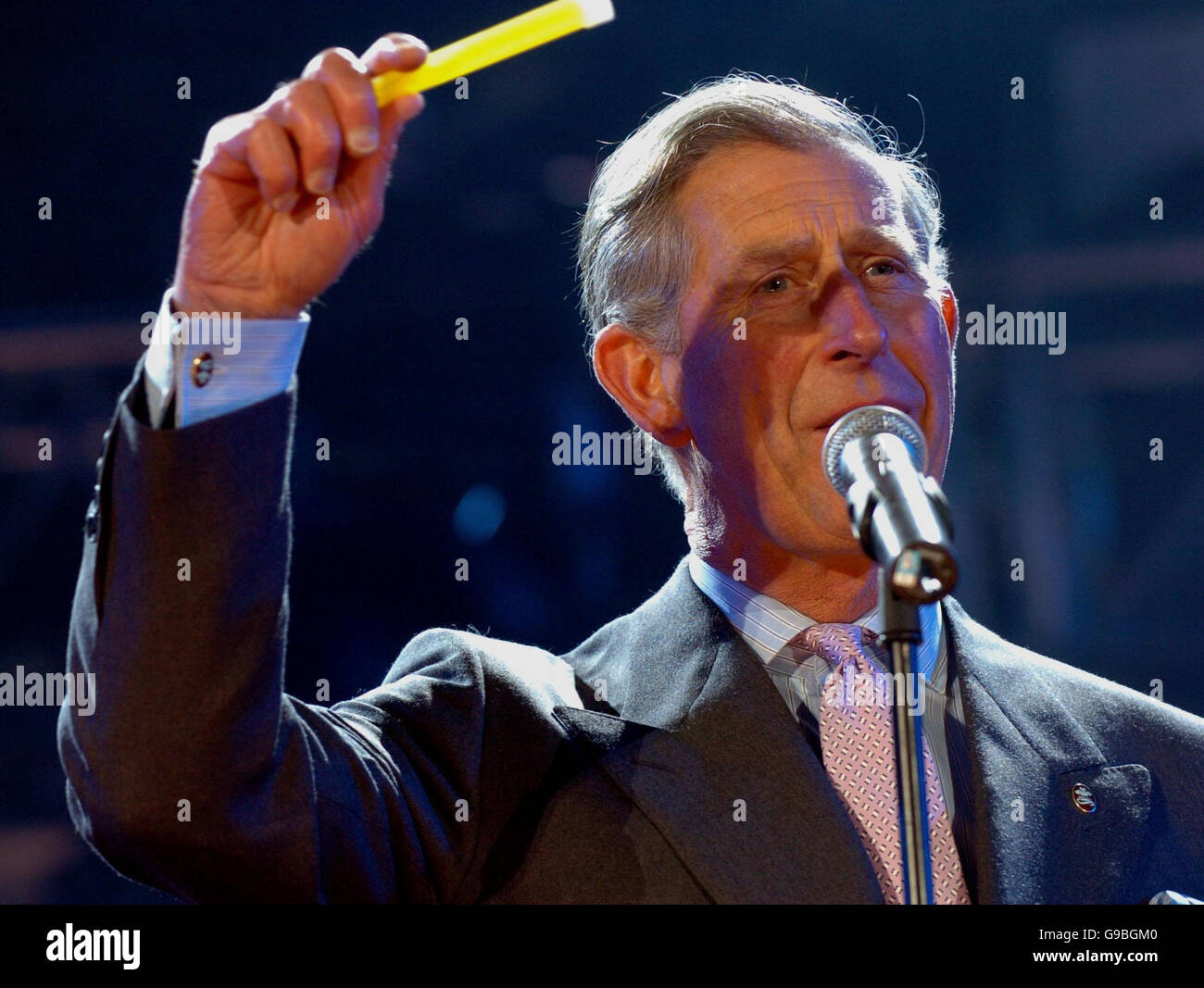 Prince Charles waves a glo stick as he speaks at the Prince's Trust ...