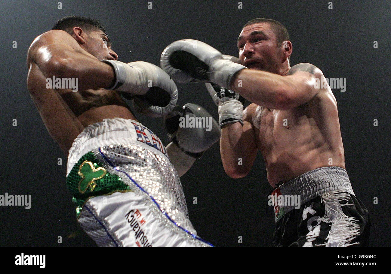 England's Amir Khan (L) and Hungary's Laszlo Komjathi during the Lightweight bout at Kings Hall ...