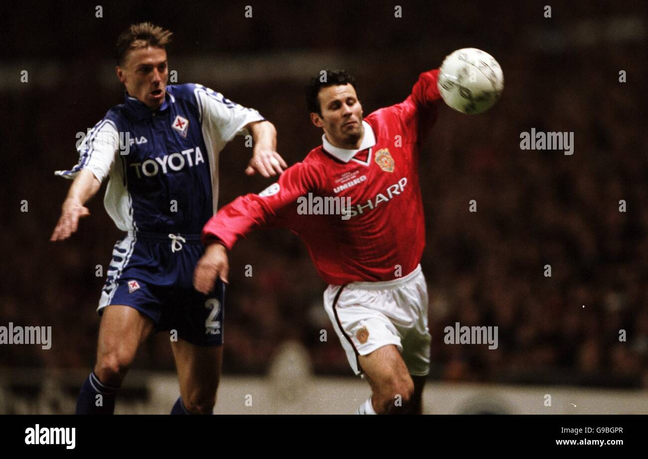 (L-R) Fiorentina's Tomas Repka challenges Manchester United's Ryan ...