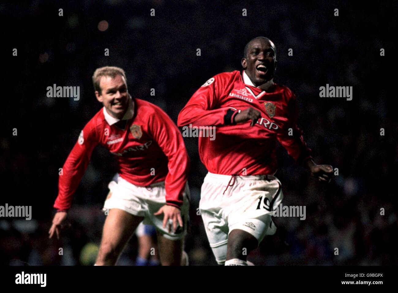 (L-R) Manchester United's Henning Berg runs to congratulate Dwight ...