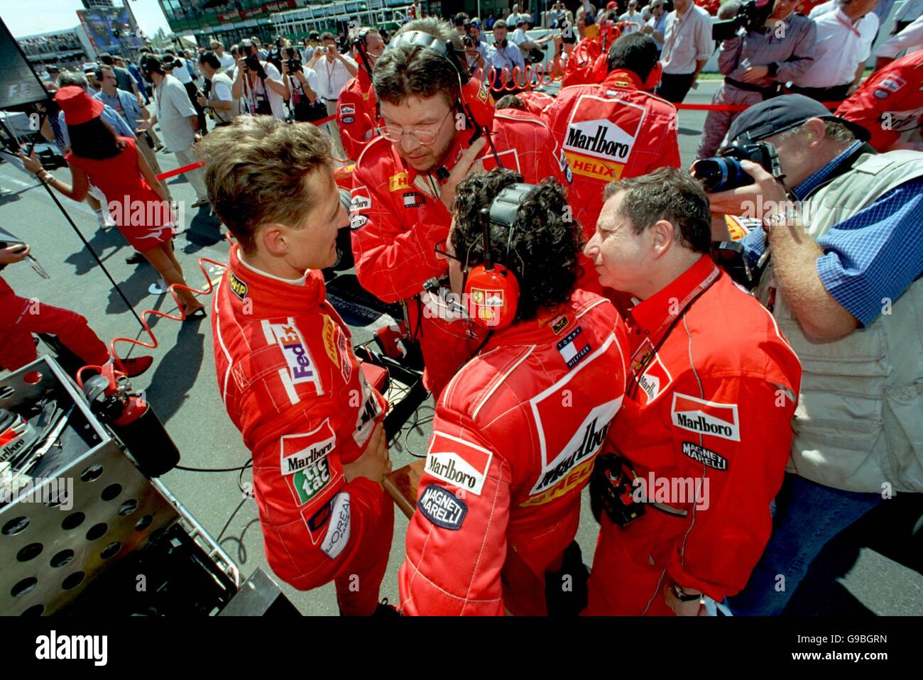 Ferraris michael schumacher r with technical director ross brawn l hi ...