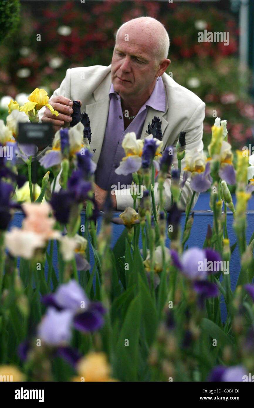 Dave Rose from Taunton, Sommerset, preens one of his flowers at the ...