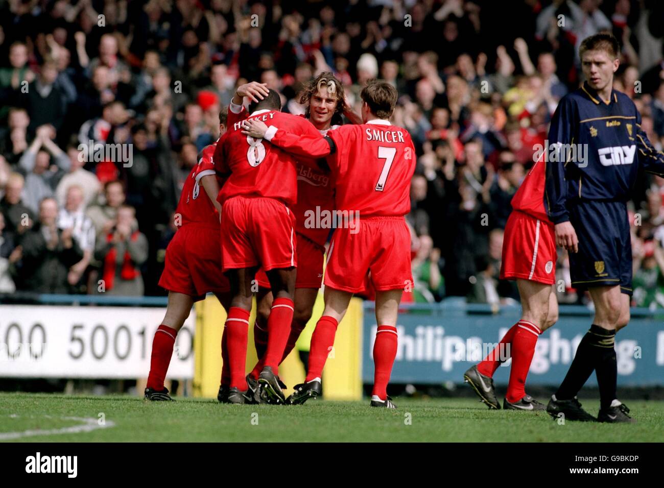 Liverpool's Emile Heskey (l) celebrates one of his goals with teammates ...