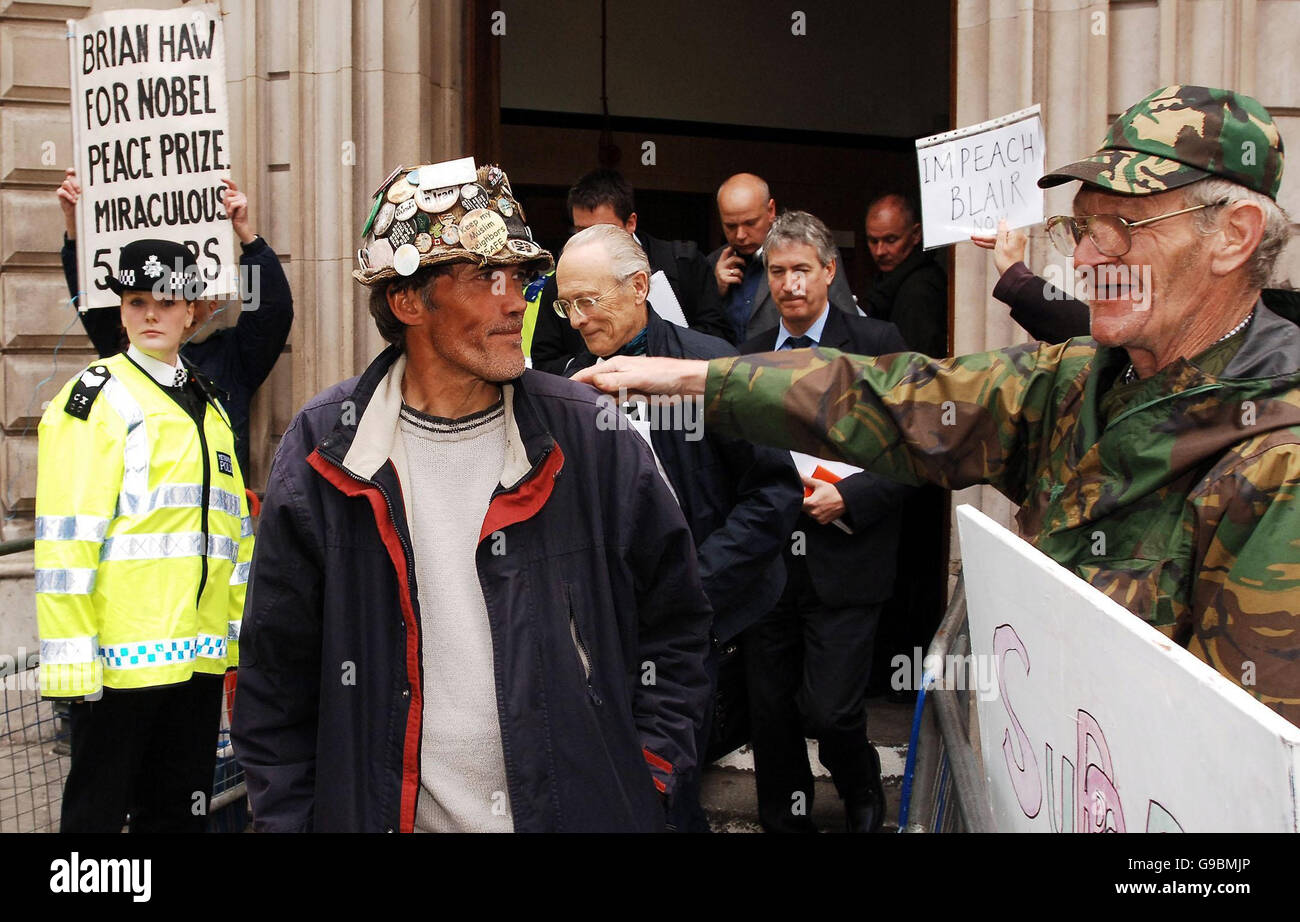 Brian Haw, the Parliament Square anti-war protester, is greeted by a ...