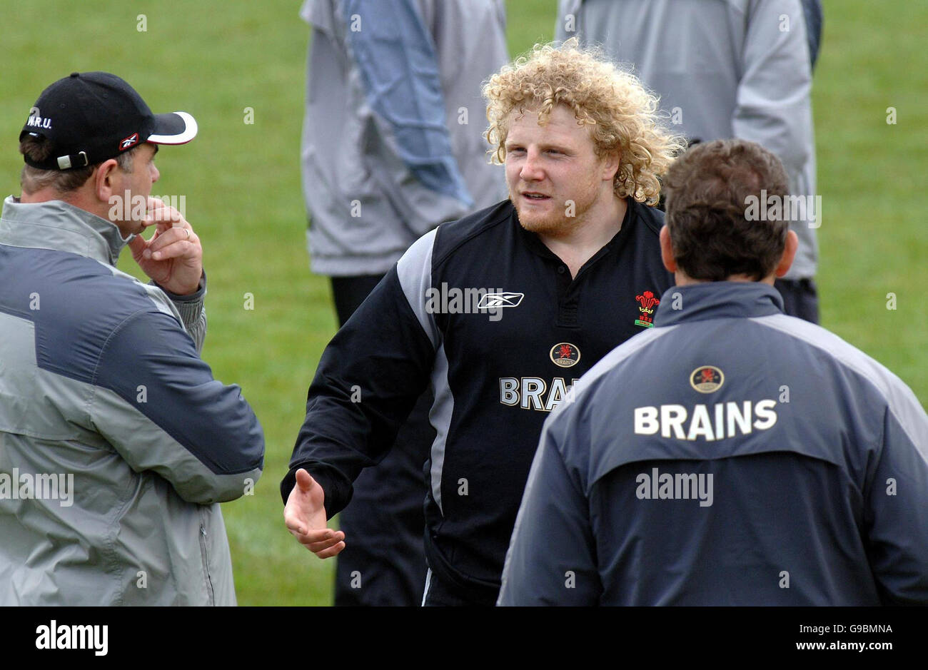 Wales' tour captain Adam Jones (centre) talks to coach Rowland Phillips ...