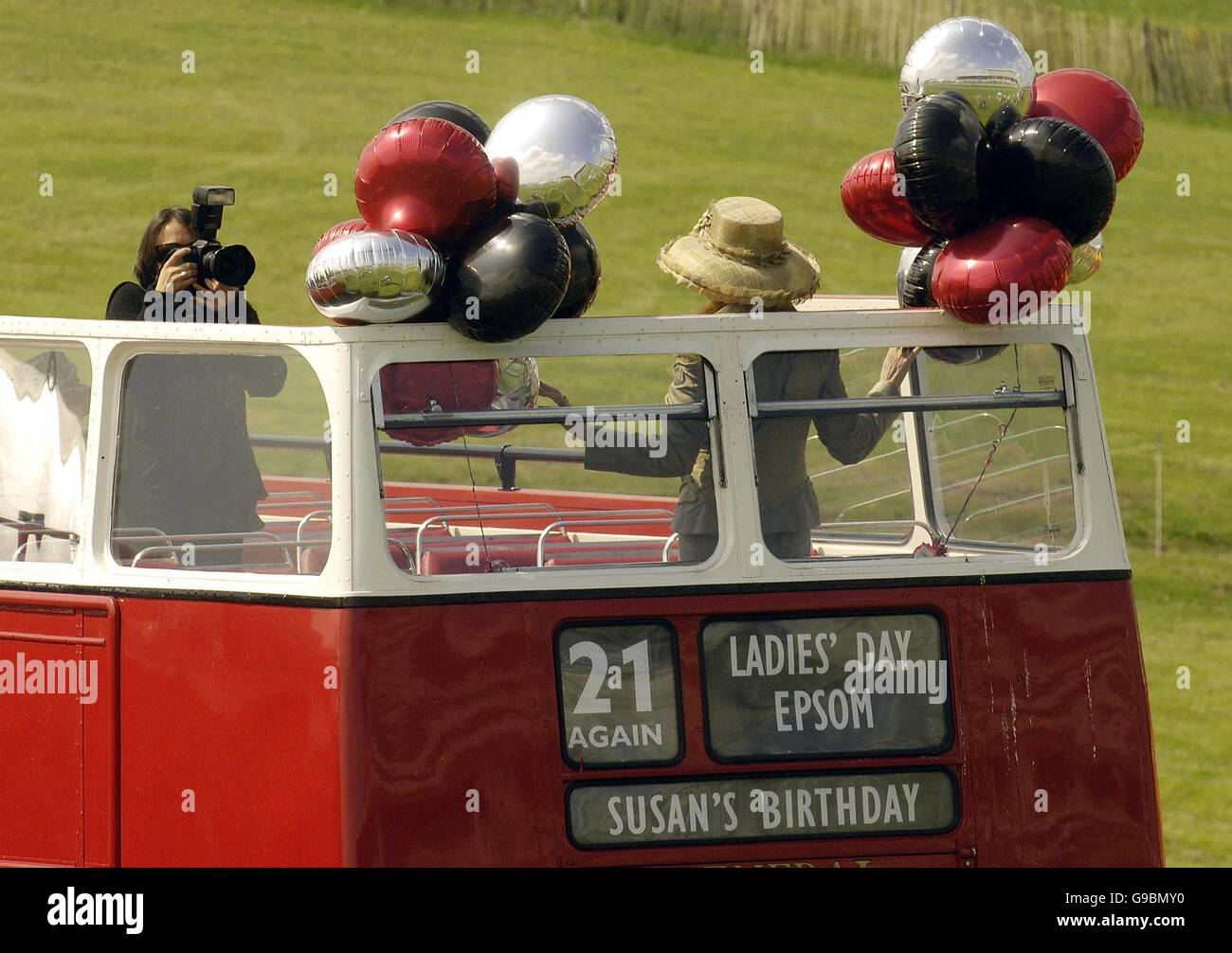 Traditional open top buses begin to arrive at Epsom racecourse ahead of ...
