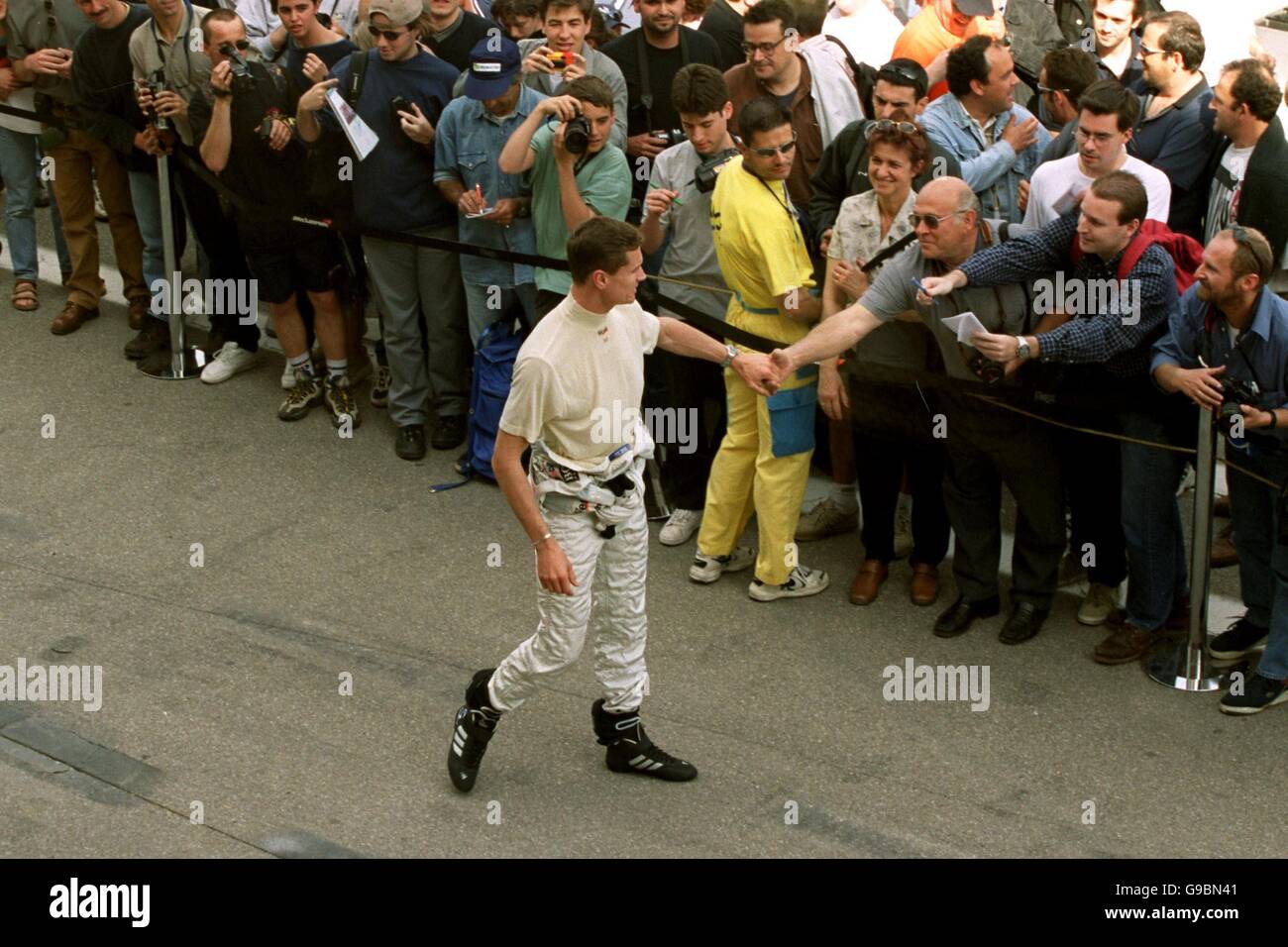 David Coulthard shakes hands with fans at the circuit Stock Photo - Alamy