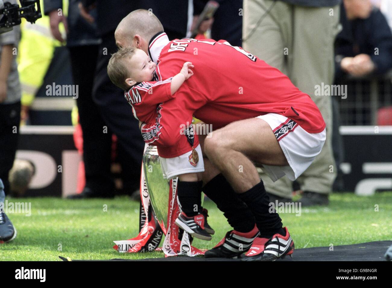 Manchester uniteds david beckham gives his son brooklyn a hug hi-res ...