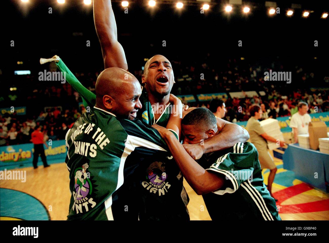 Manchester Giants' Phil Handy (c) celebrates victory with his teammates ...