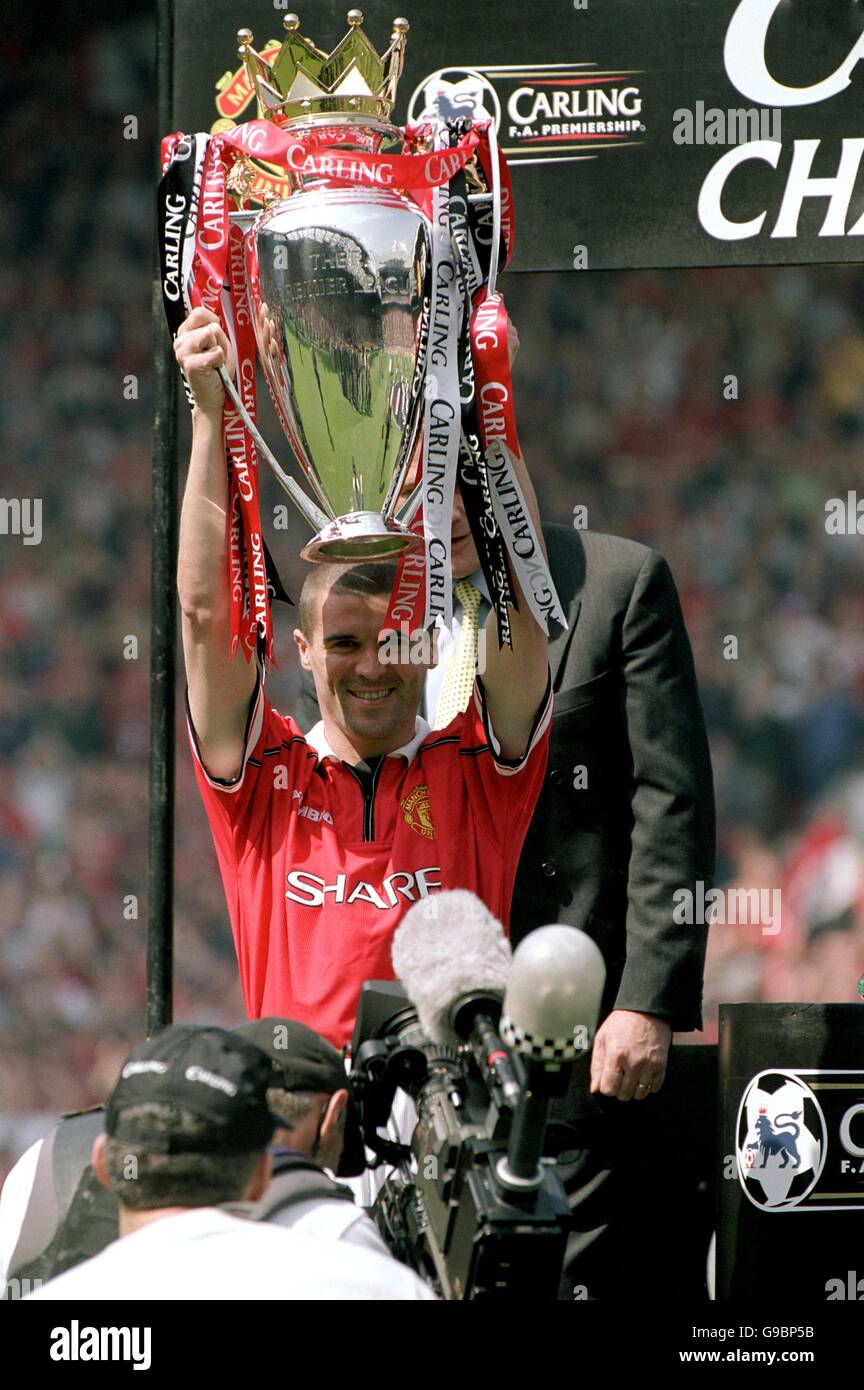 Celebration trophy lifting ribbons football hi-res stock photography ...