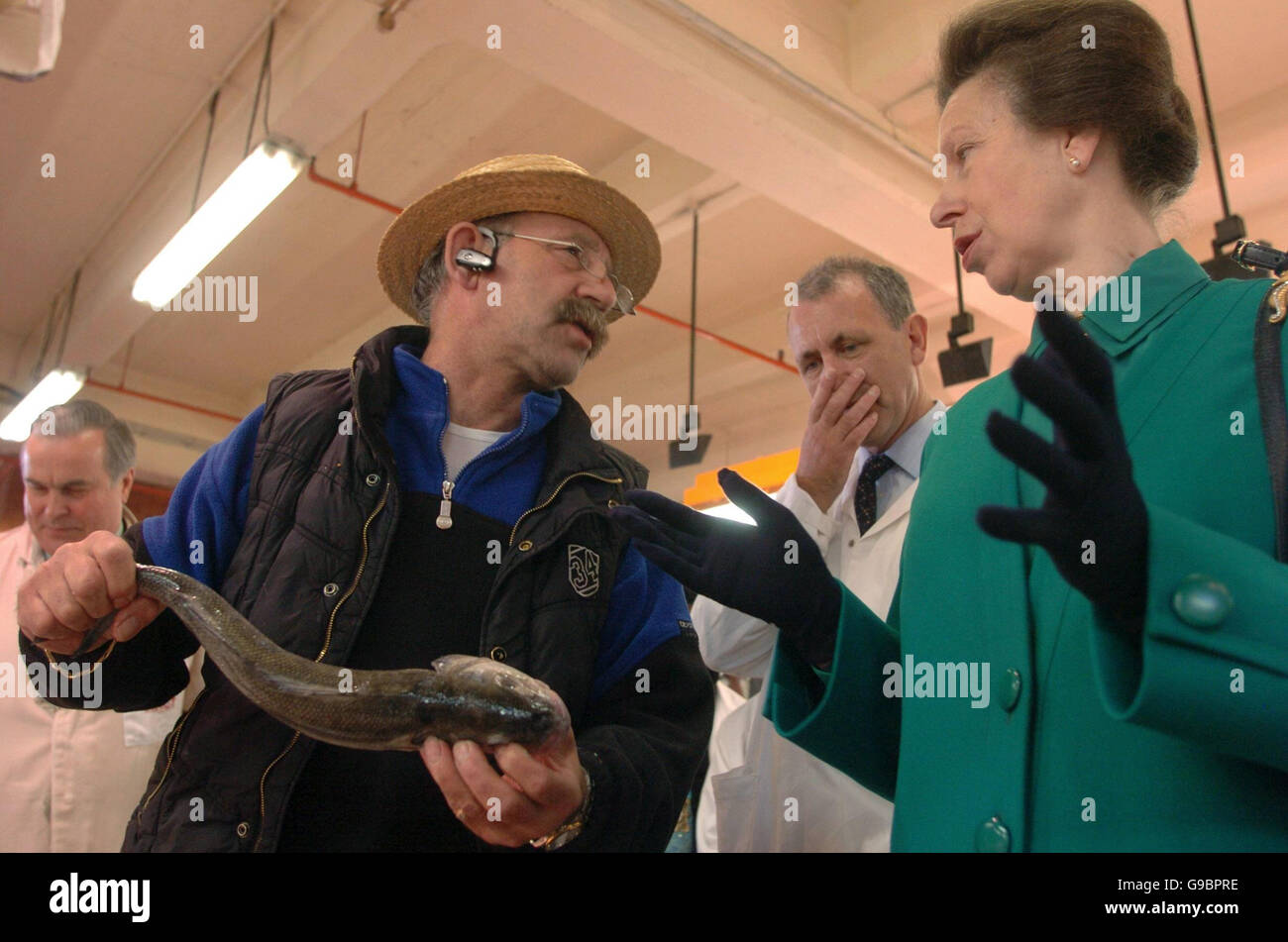 The Princess Royal is shown a wild sea bass by fish merchant Roger ...