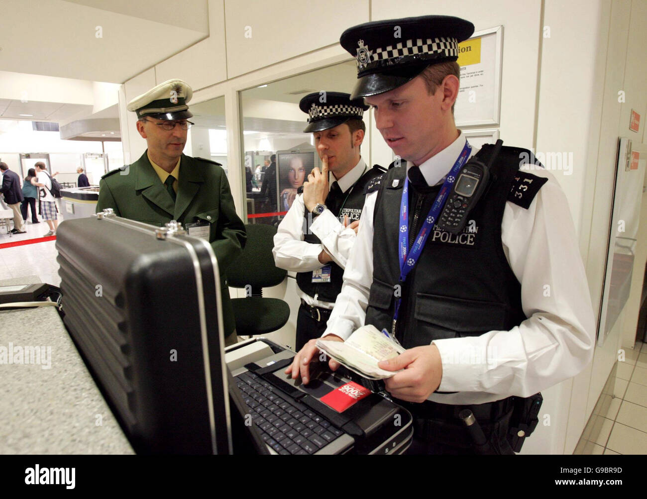 Watched by German Police Inspector Ronald Makowsky from Hanover (left ...