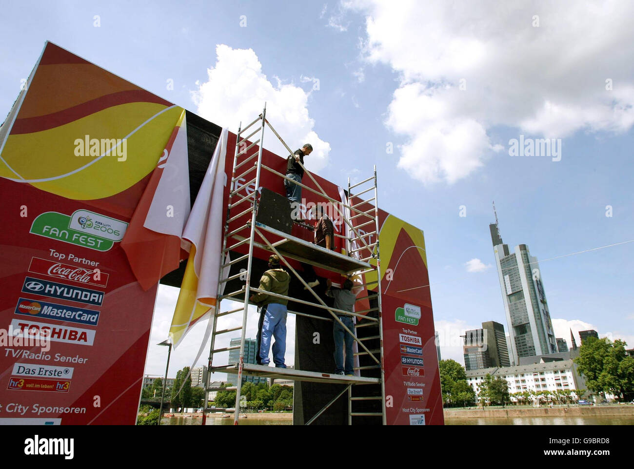 Workers prepare display boards in Frankfurt, Germany, ahead of England ...