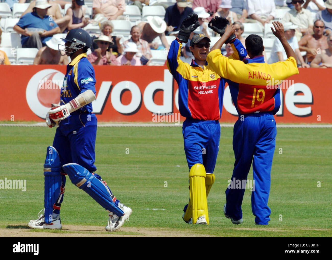 Essex's Jahid Ahmed celebrates with team-mate James Foster after ...