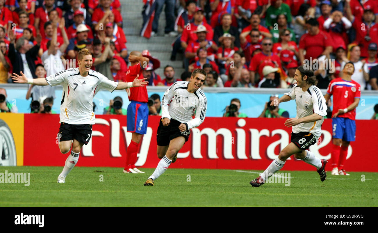 Germany's Philip Lahm (C) celebrates scoring the first goal of the ...