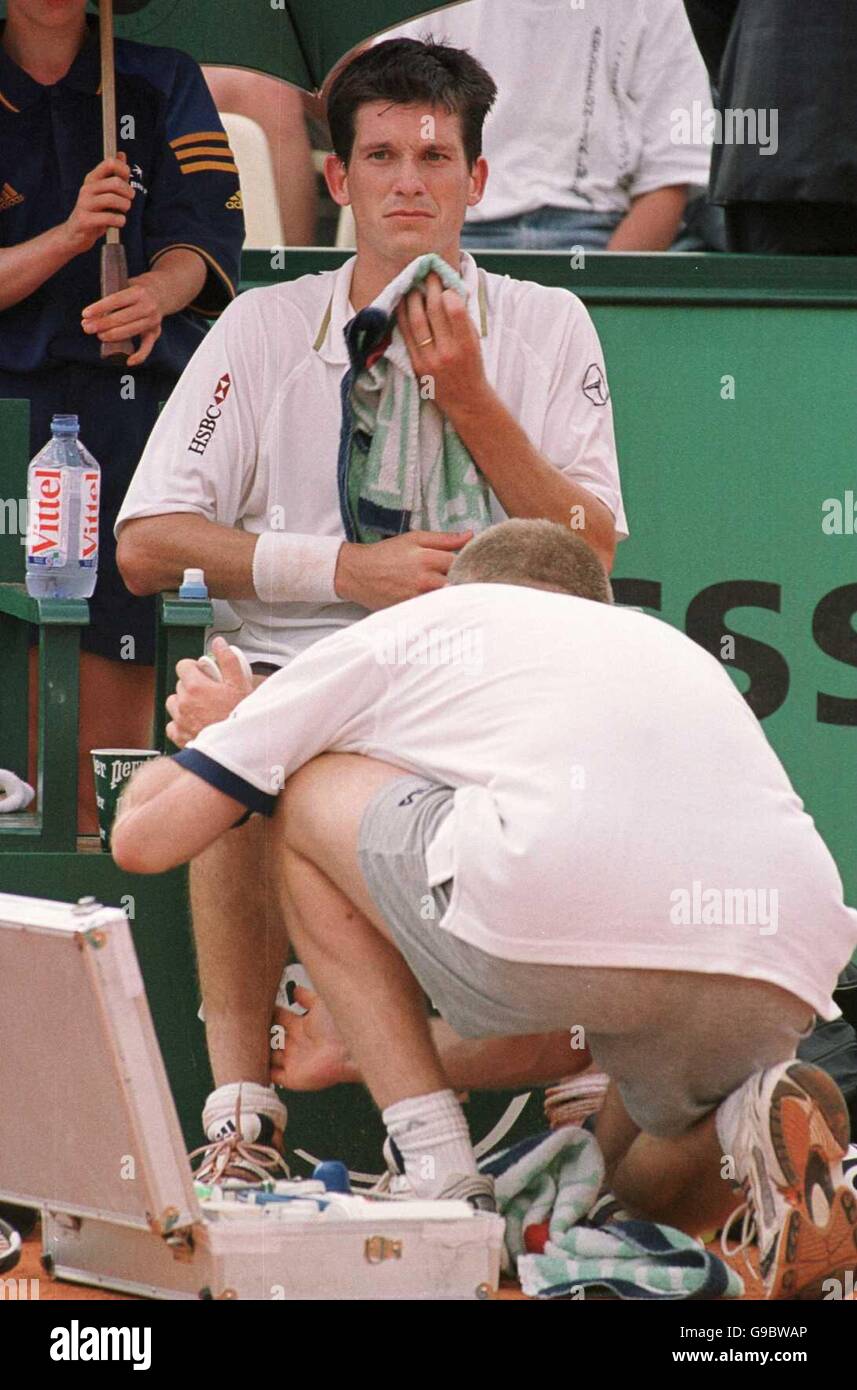 Grim looking tim gets treatment trainer defeat fernando vicente hi-res ...