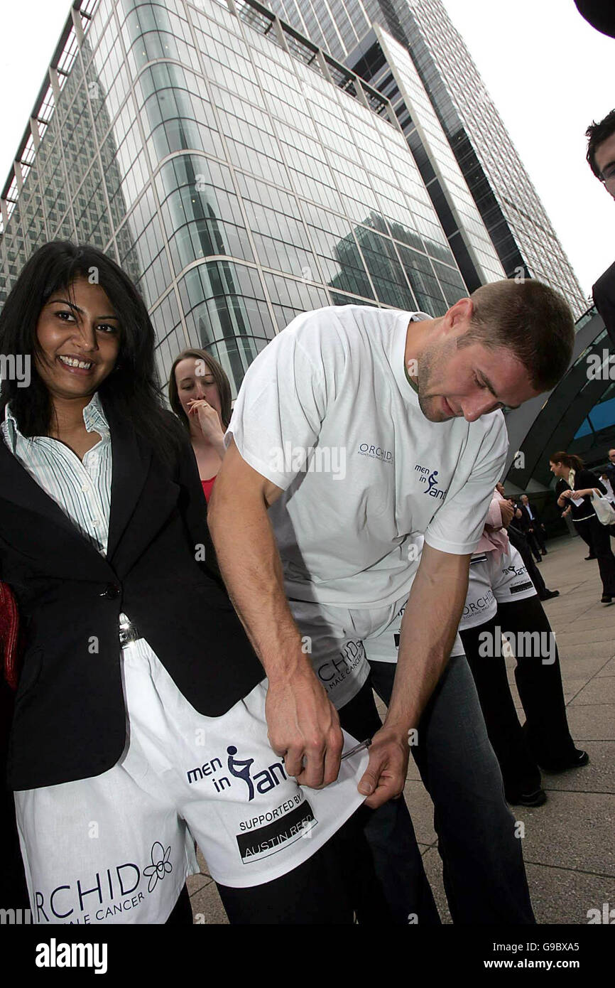 Rugby star Ben Cohen signs an autograph for a fan during the annual Men ...