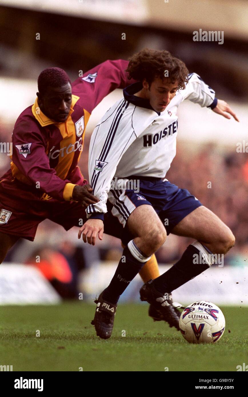Tottenham hotspurs mauricio taricco holds off bradford citys jamie ...