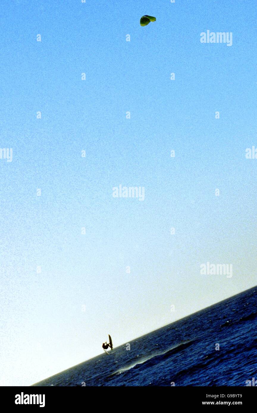 Parasurfing - Perth Beach, Australia. A parasurfer rides the waves off ...