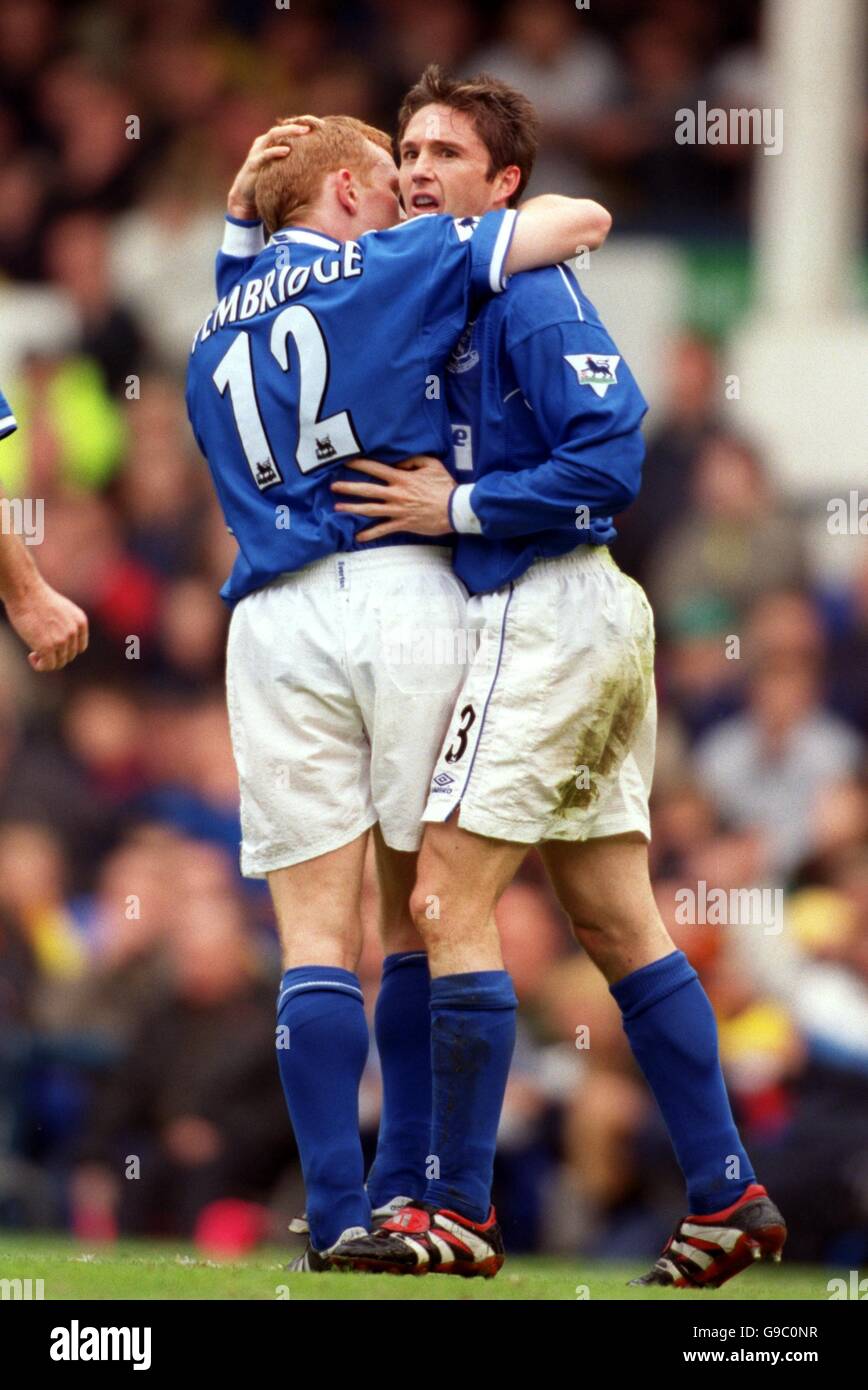 (L-R) Everton's Mark Pembridge congratulates goalscorer Joe-Max Moore ...